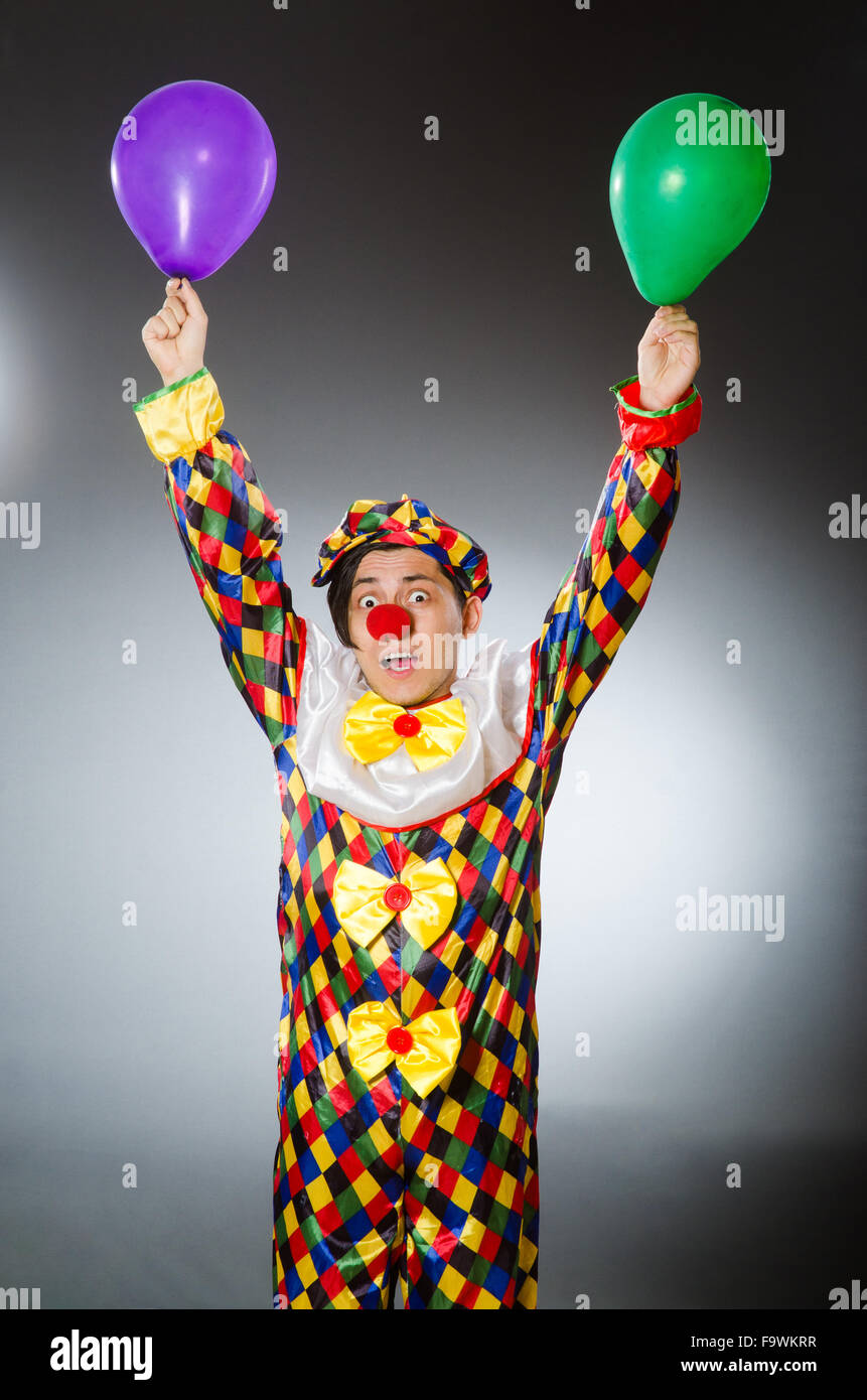 Funny clown in comical concept Stock Photo - Alamy