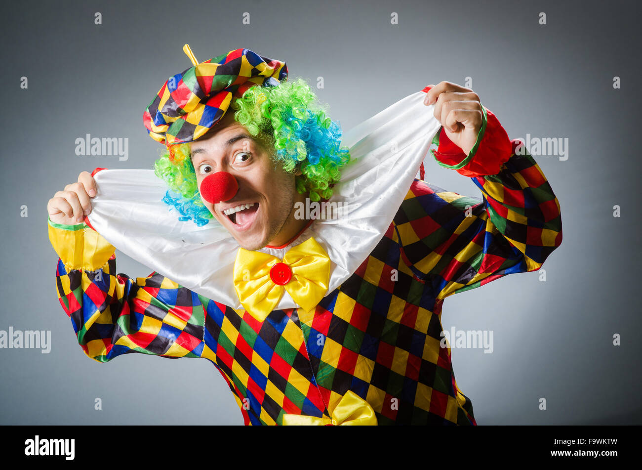 Funny clown in comical concept Stock Photo - Alamy