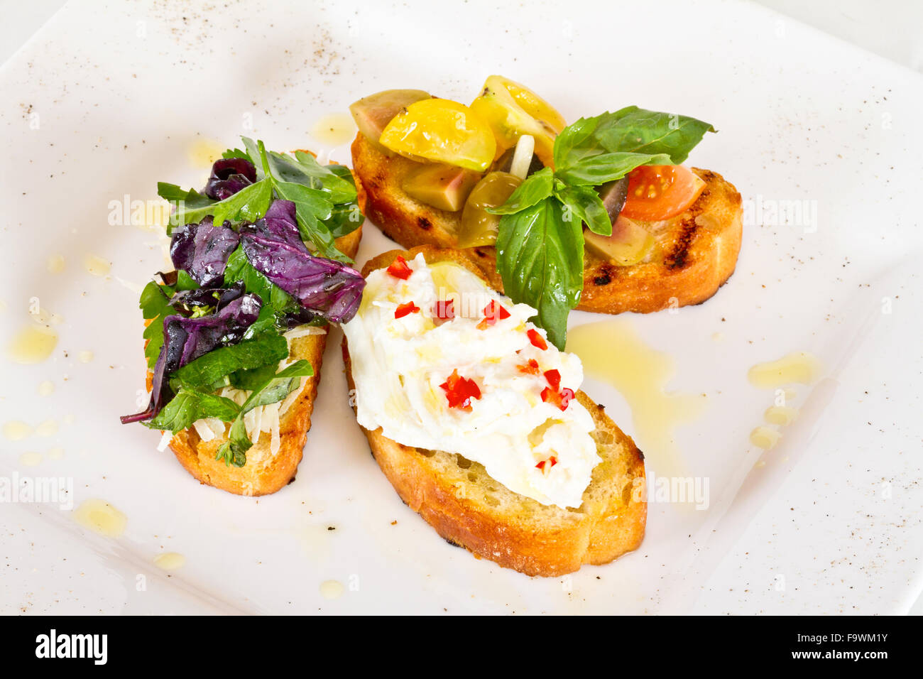 different colored Canapes on a white background Stock Photo - Alamy