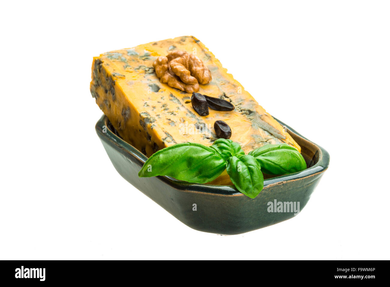 Gold cheese with mould Stock Photo - Alamy
