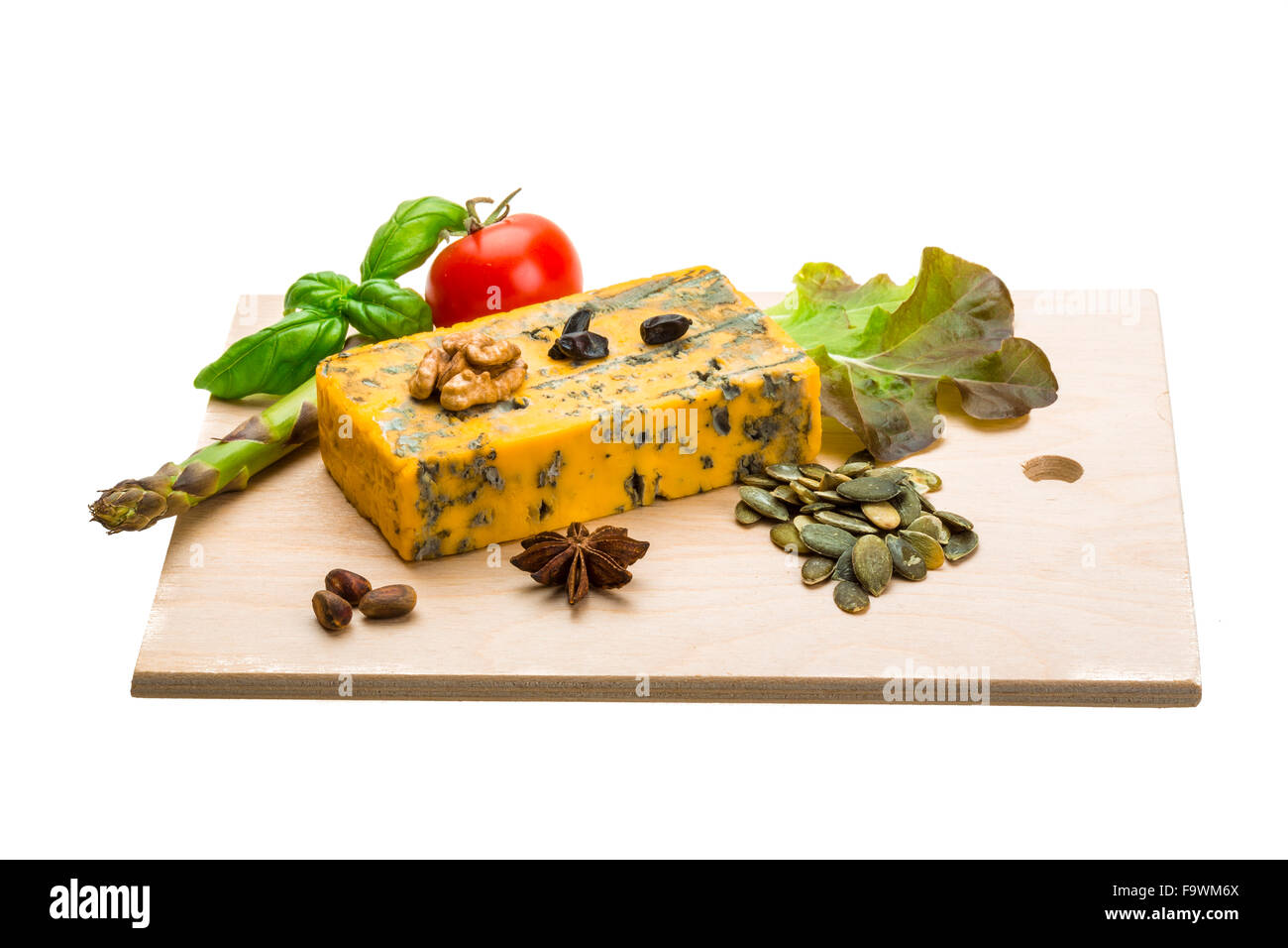 Gold cheese with mould Stock Photo - Alamy
