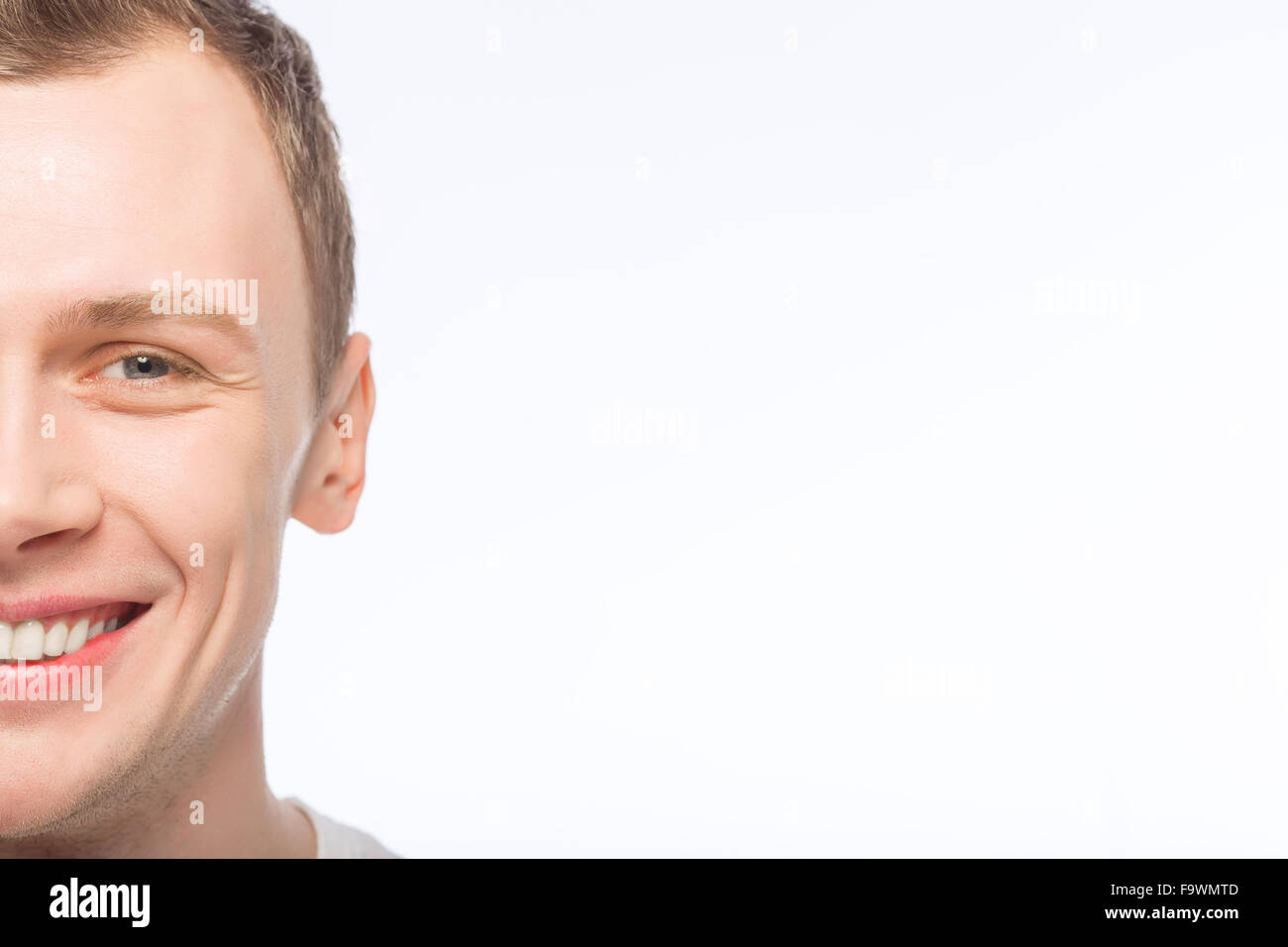 Handsome man wearing a smile Stock Photo - Alamy