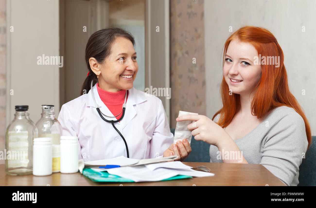 Female teenager patient listening the doctor in clinic Stock Photo - Alamy