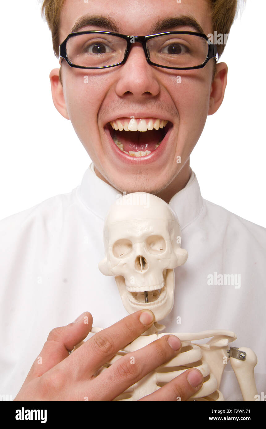 Funny doctor with skeleton isolated on white Stock Photo - Alamy