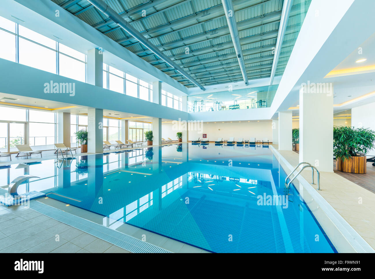 Indoor swimming pool in healthy concept Stock Photo - Alamy