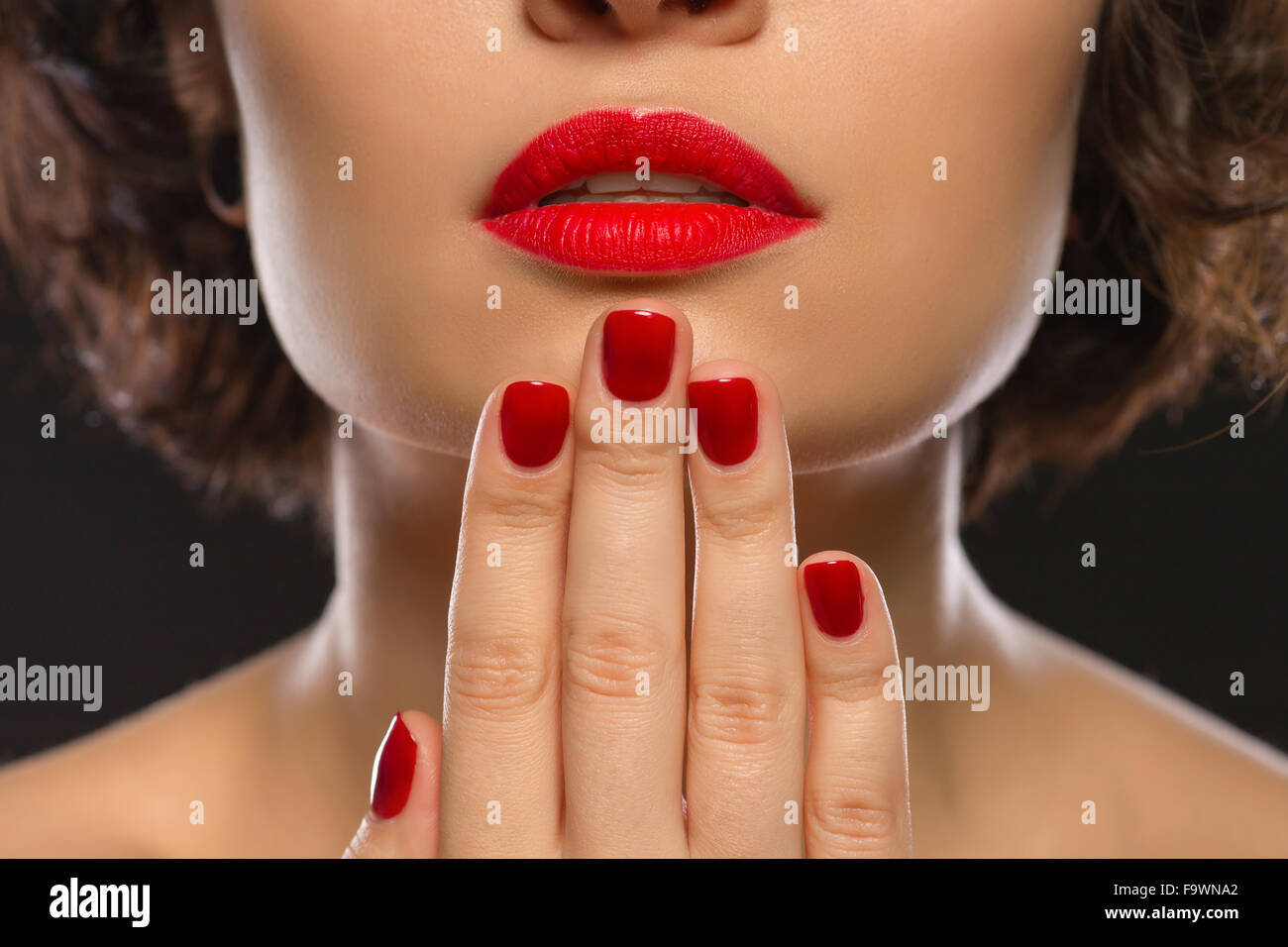 Young attractive lady upholding one hand Stock Photo - Alamy