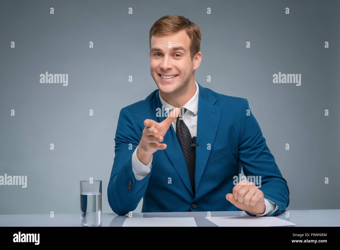 Male newscaster hi-res stock photography and images - Alamy