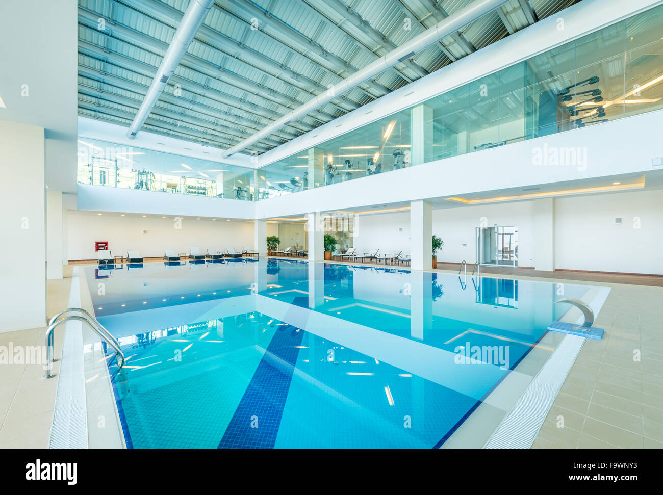 Indoor swimming pool in healthy concept Stock Photo - Alamy