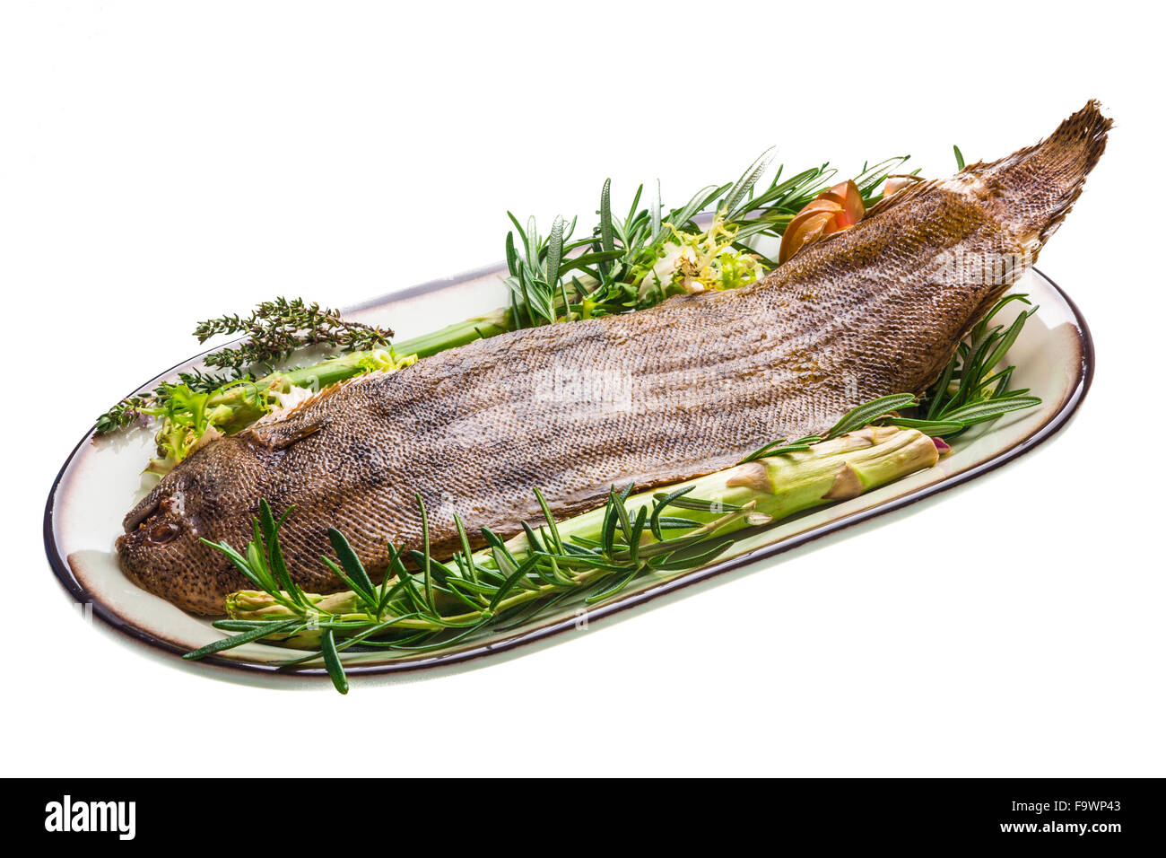 Fish Dover sole roasted Stock Photo - Alamy