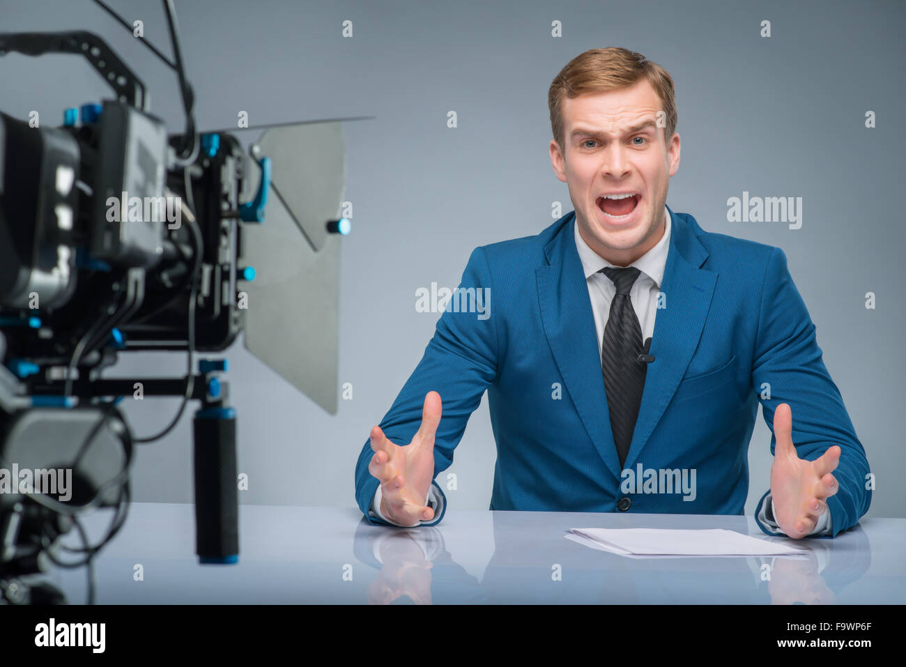 Newsman is extremely stressed out Stock Photo - Alamy