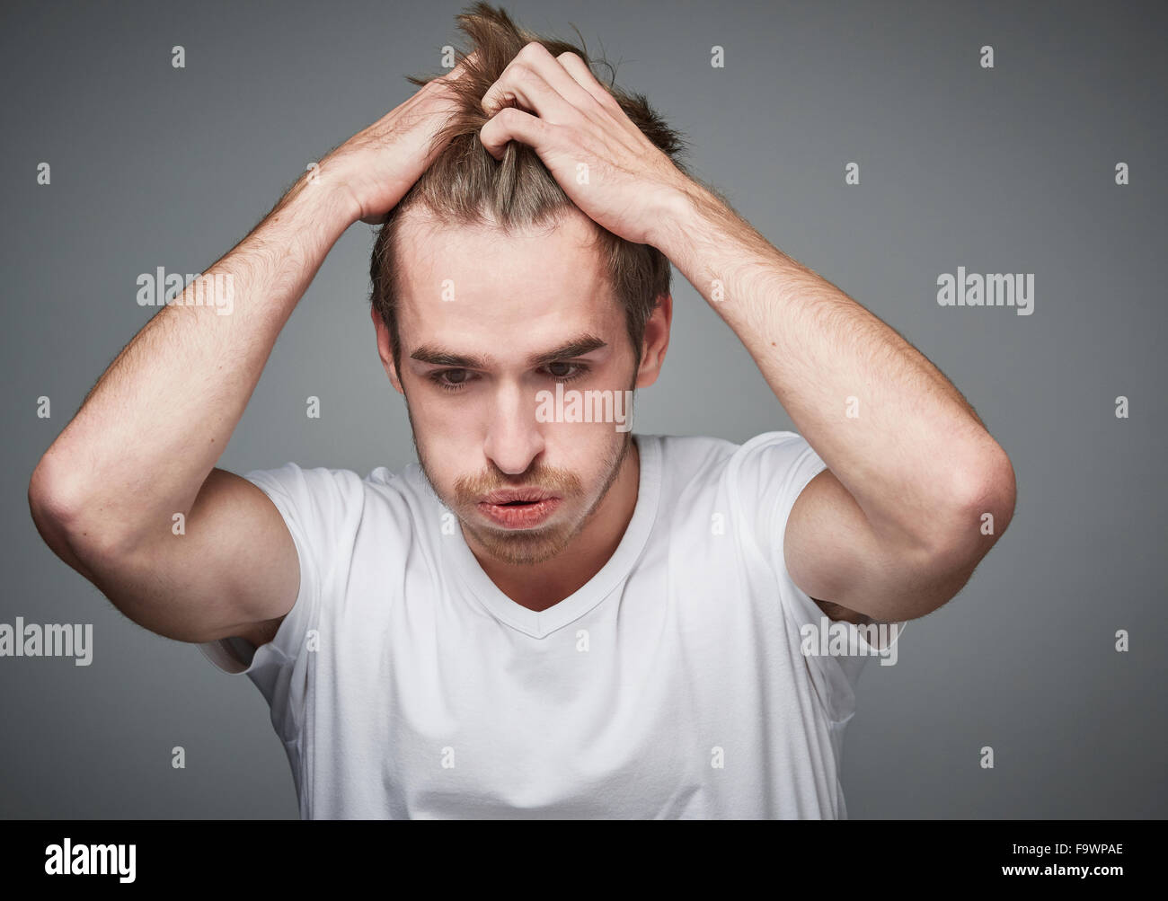 Distraught man hi-res stock photography and images - Alamy