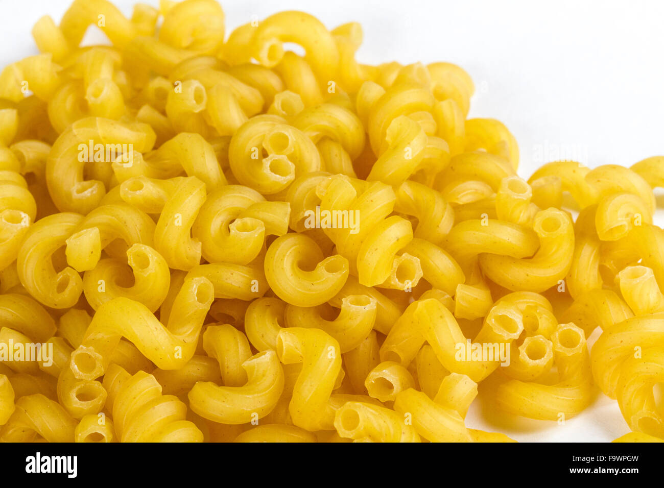 italian pasta (macaroni) isolated on white background Stock Photo - Alamy