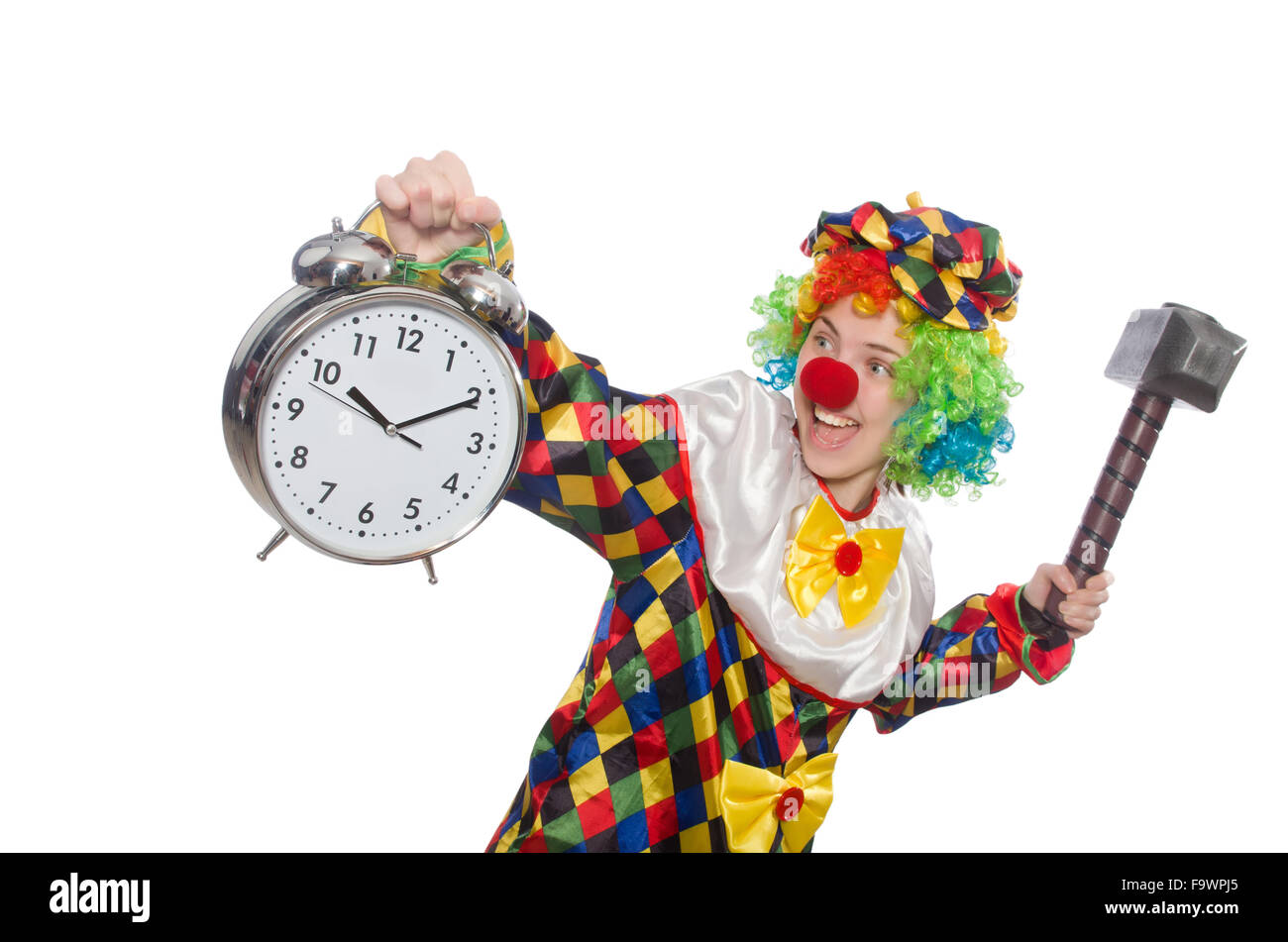 Clown with clock and hammer isolated on white Stock Photo - Alamy