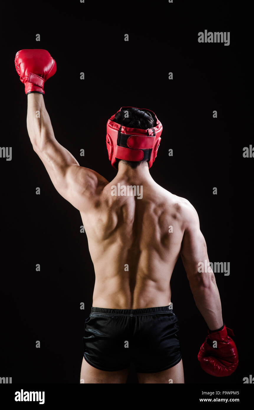 Muscular man in boxing concept Stock Photo - Alamy