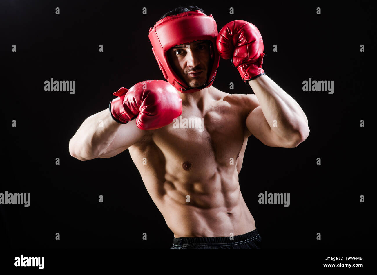 Muscular man in boxing concept Stock Photo - Alamy