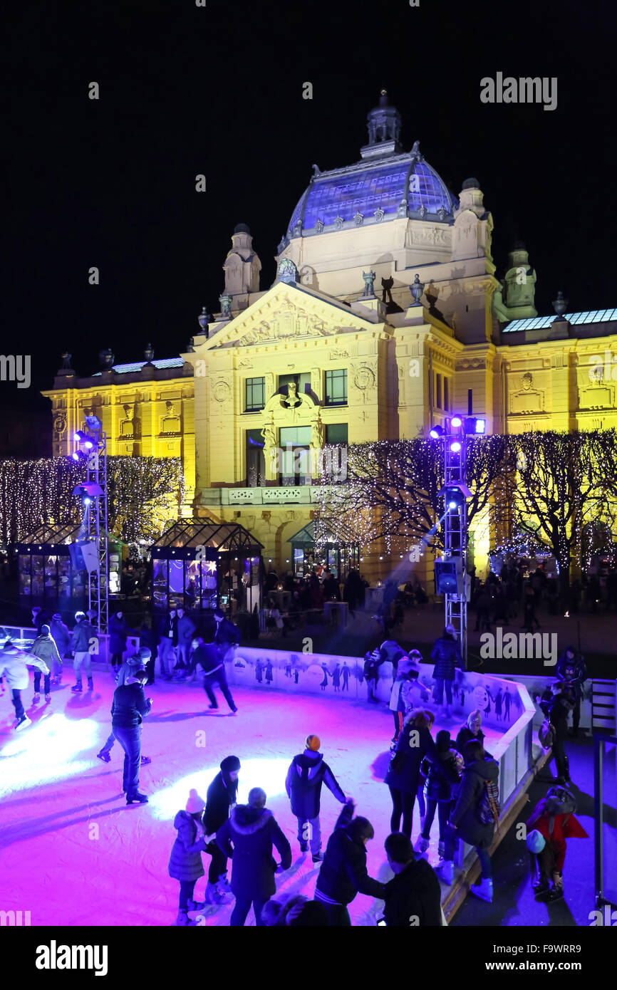 People skating on city skating rink in front of the Art Pavilion in ...