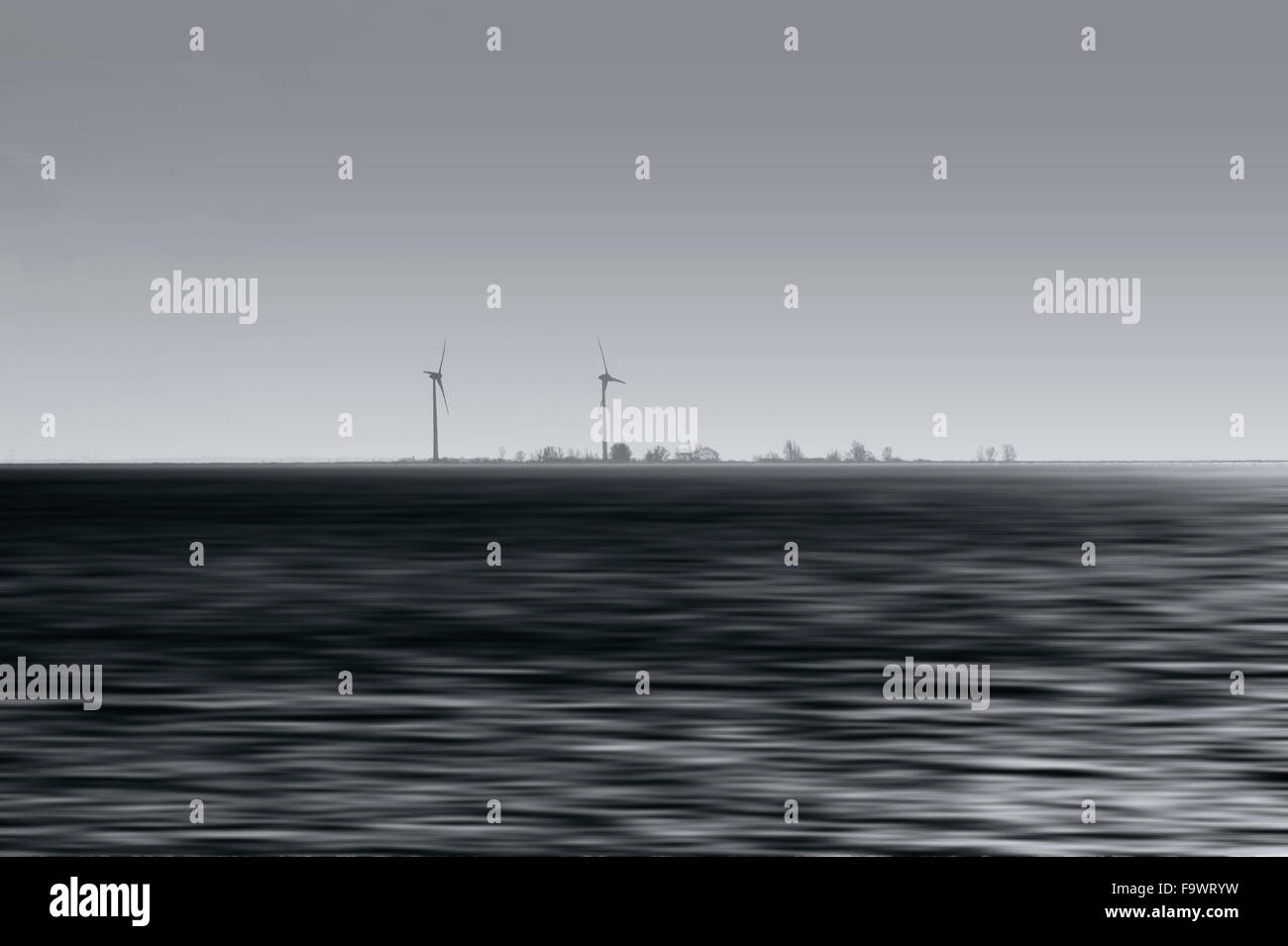 Island with wind turbines Stock Photo - Alamy