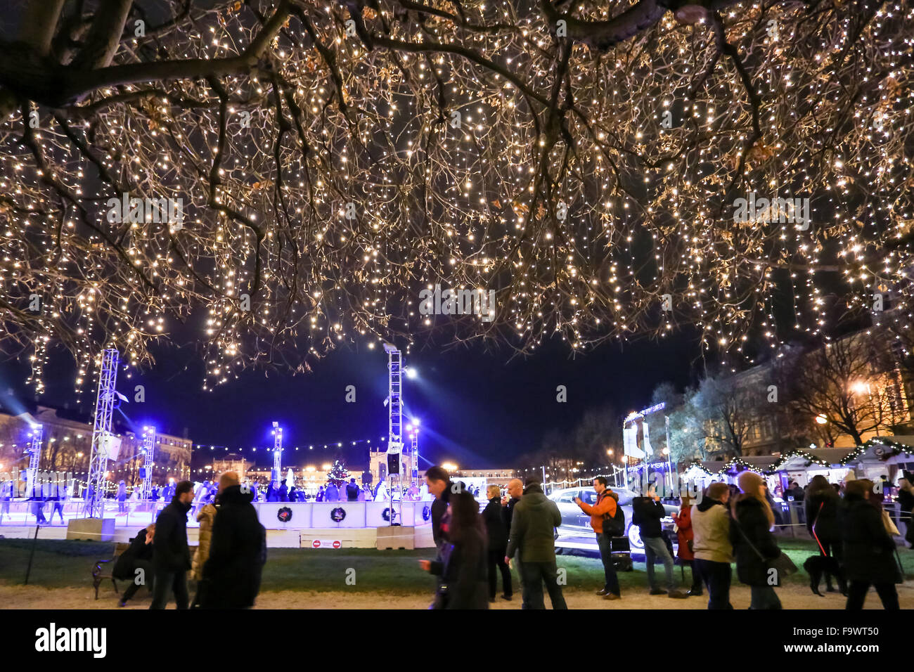 People walking in front of the ice skating rink at Advent time in King ...