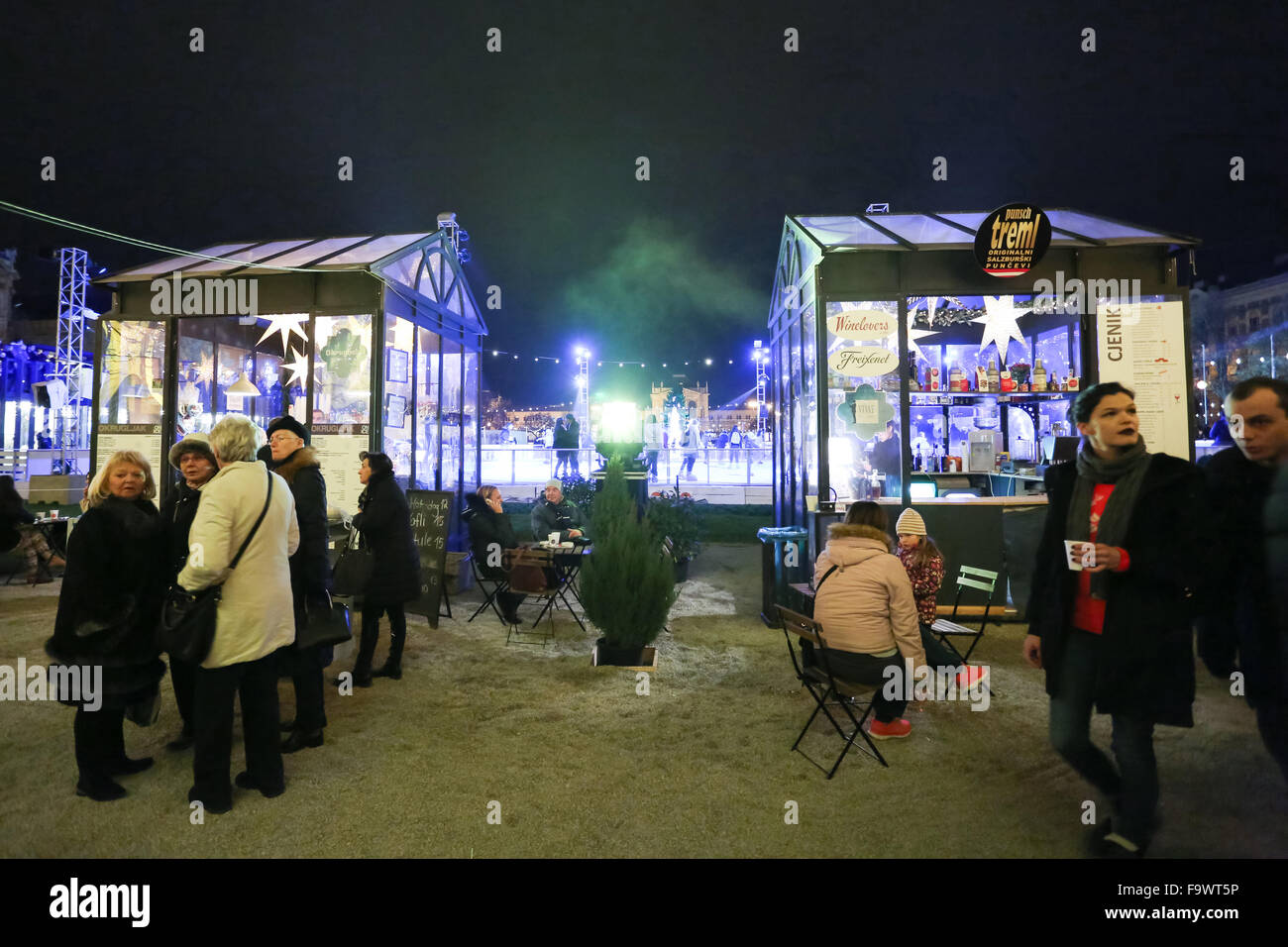 People walking in front of the ice skating rink at Advent time in King ...