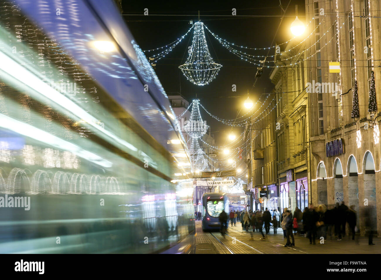 City trams passing by in Ilica street at Advent time in Zagreb, Croatia ...