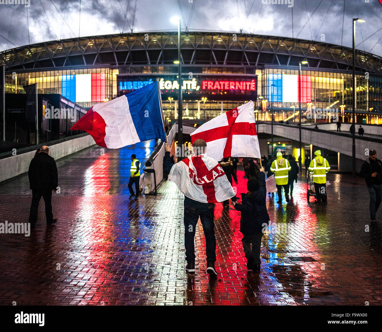 Fans waving English and French Tricolorè flags arrive at Wembley ...