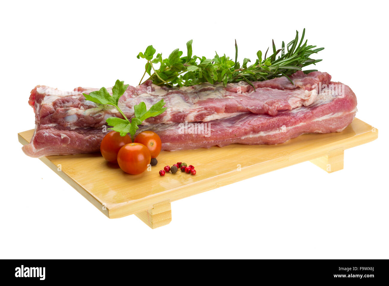 Raw pork meat with herbs and spices Stock Photo - Alamy