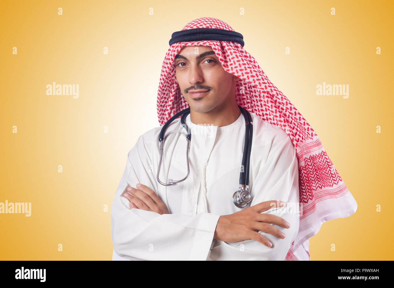 Arab doctor with stethoscope on white Stock Photo - Alamy