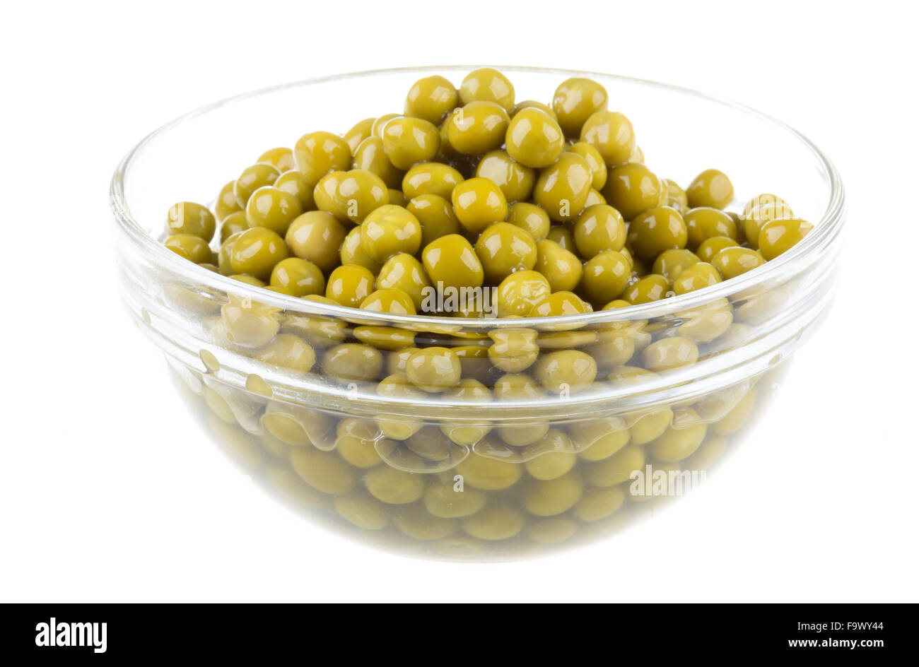 green peas, in a bowl, isolated, white background Stock Photo - Alamy