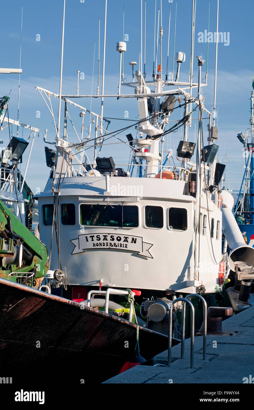 Vertical picture of a commercial tuna fishing vessels in port ...
