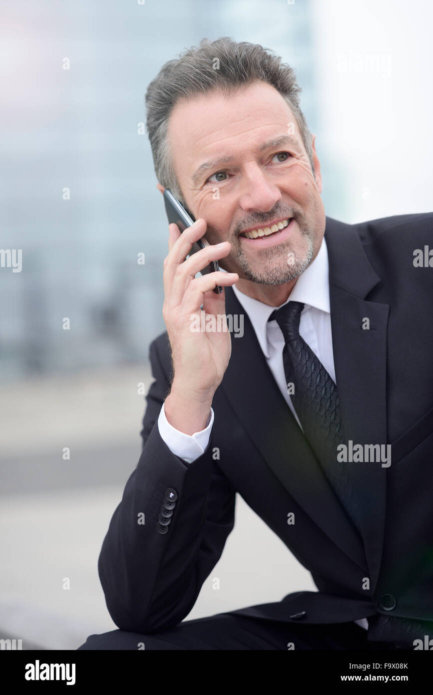 Businessman using smartphone Stock Photo - Alamy