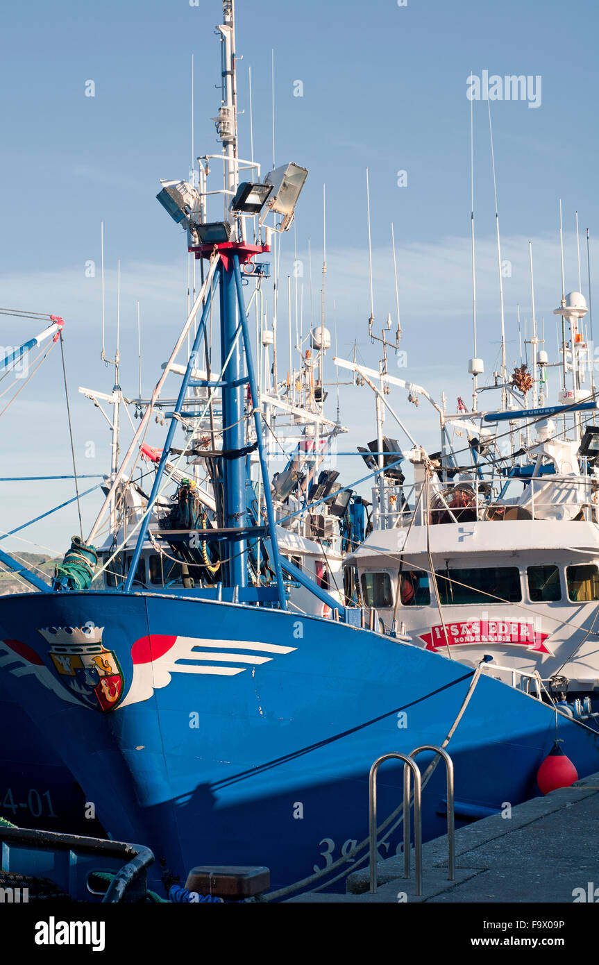 Vertical picture of a commercial tuna fishing vessels in port ...