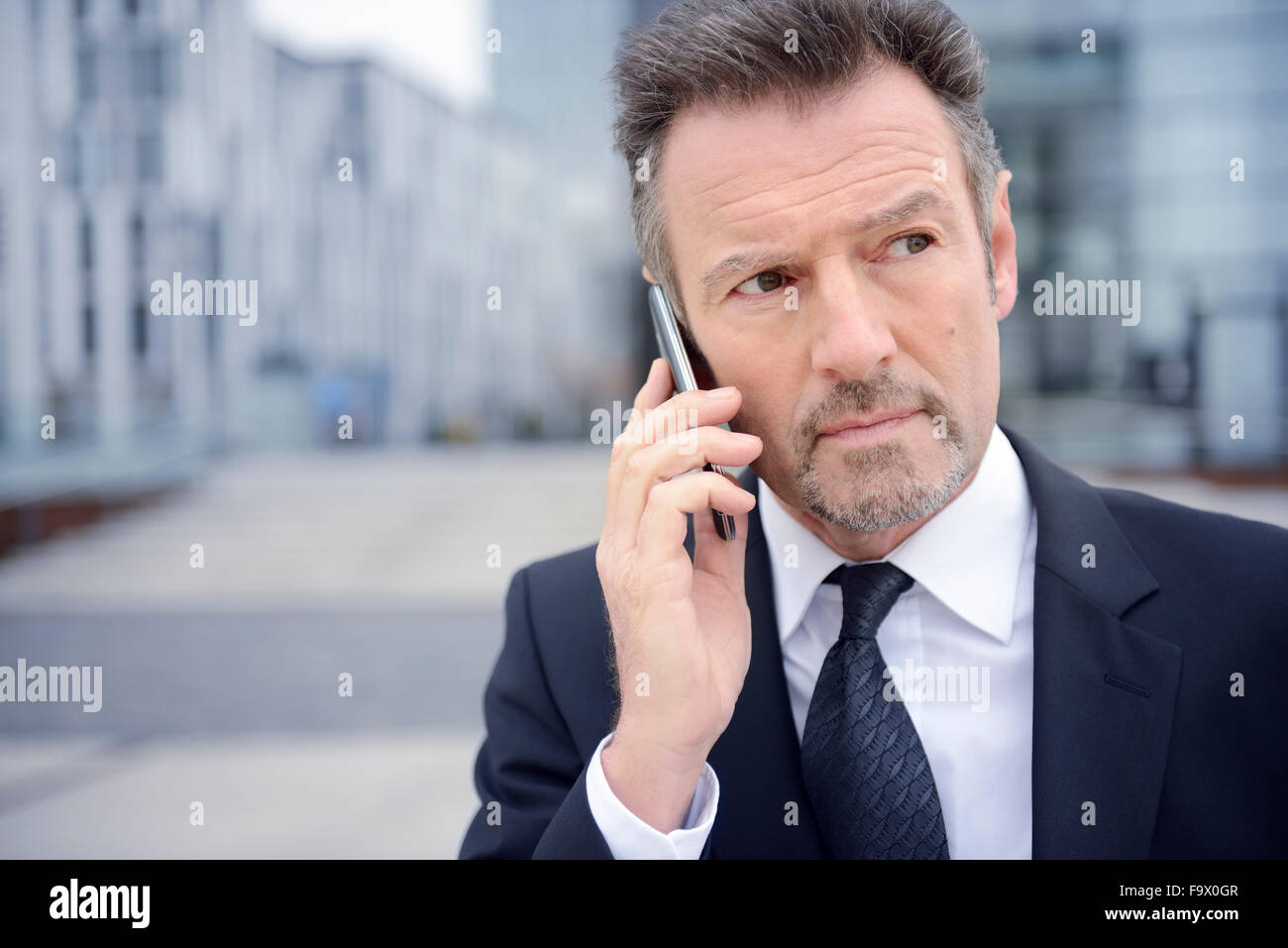 Businessman using smartphone Stock Photo - Alamy