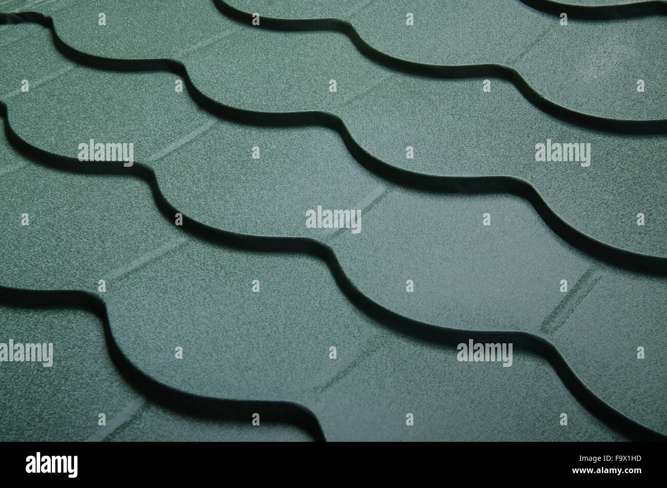 Close up of metal roof tile Stock Photo - Alamy