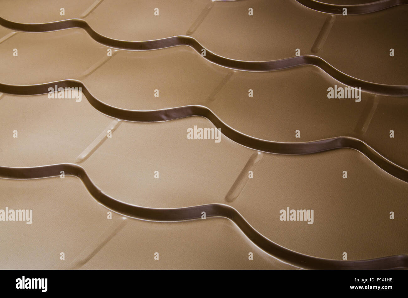 Close up of metal roof tile Stock Photo - Alamy