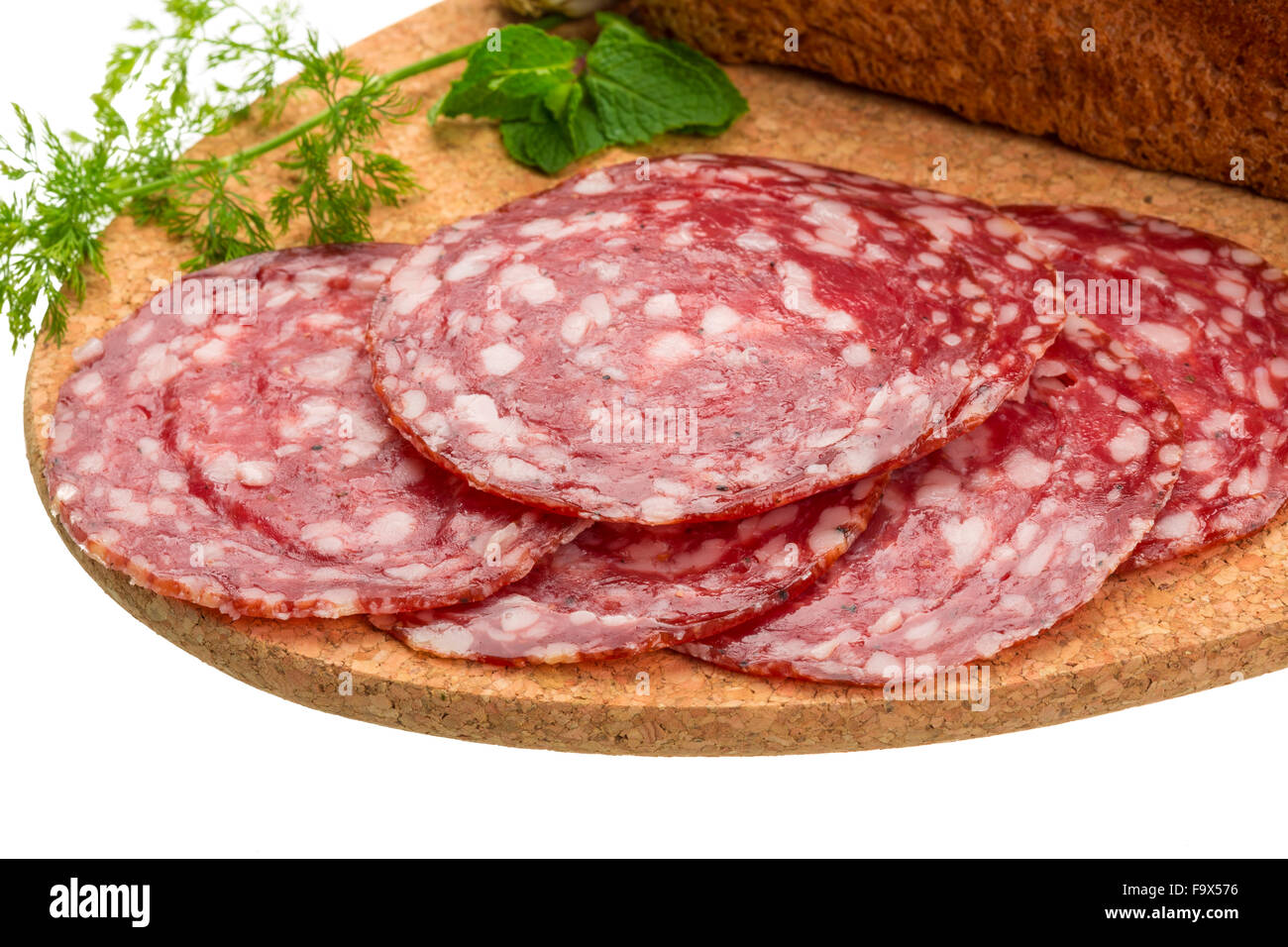Fresh ripe salami with bread and vegetables Stock Photo - Alamy