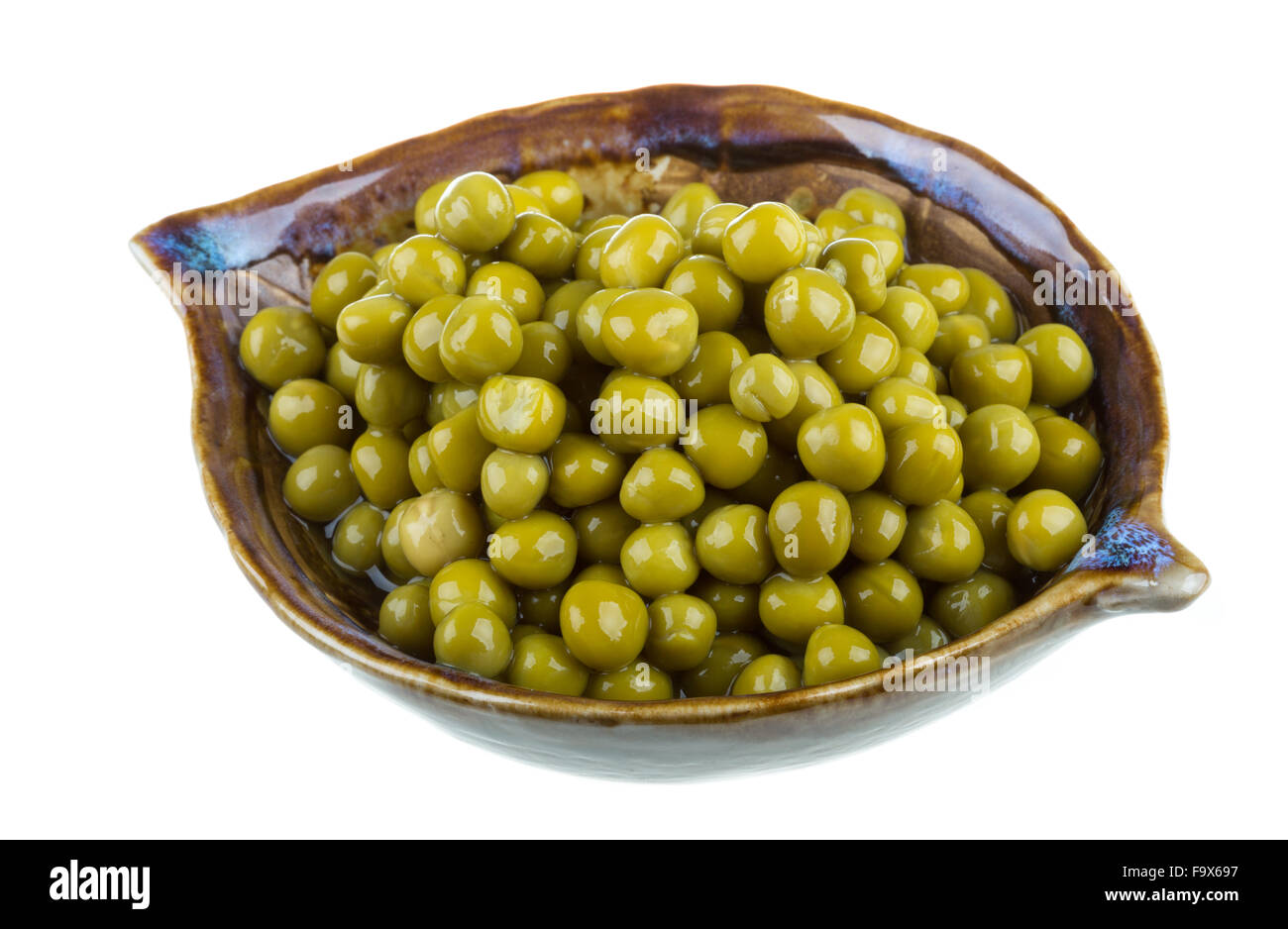 green peas, in a bowl, isolated, white background Stock Photo - Alamy