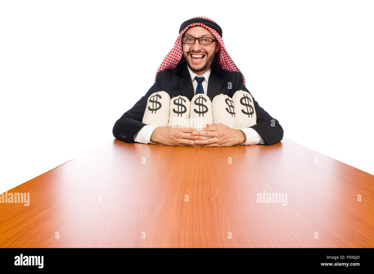 Arab businessman with sacks of money Stock Photo - Alamy