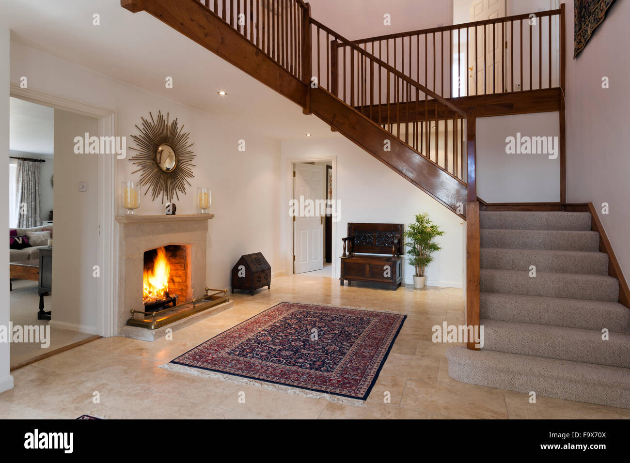 UK real estate. Large entrance hallway and staircase Stock Photo - Alamy