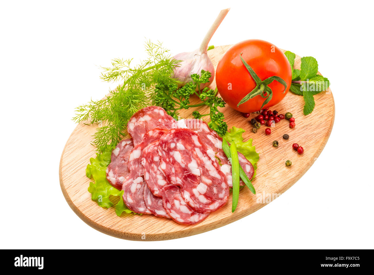 Fresh ripe salami with vegetables Stock Photo - Alamy