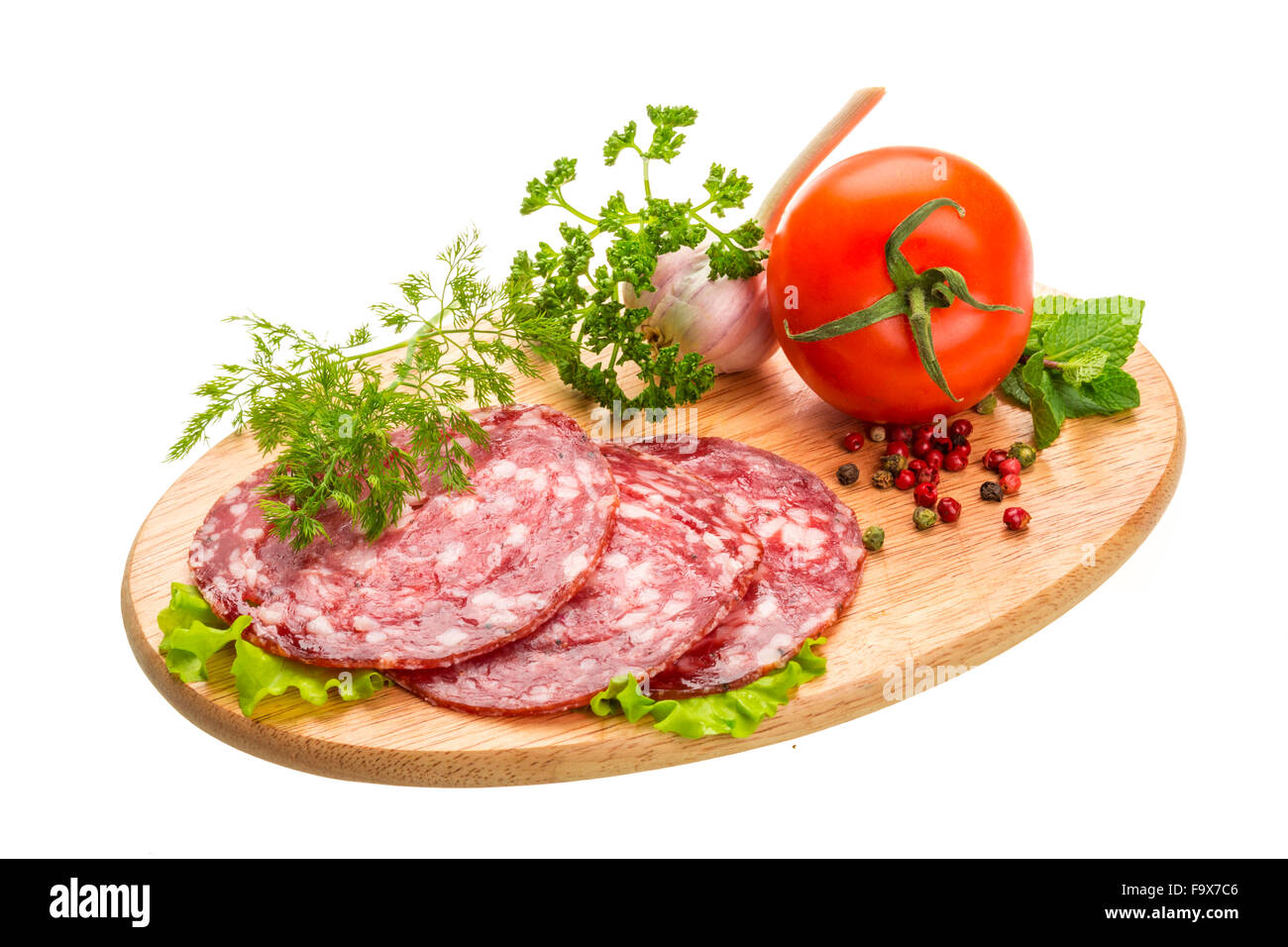 Fresh ripe salami with vegetables Stock Photo - Alamy