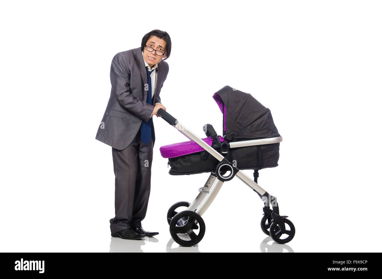 Funny dad with baby and pram on white Stock Photo - Alamy