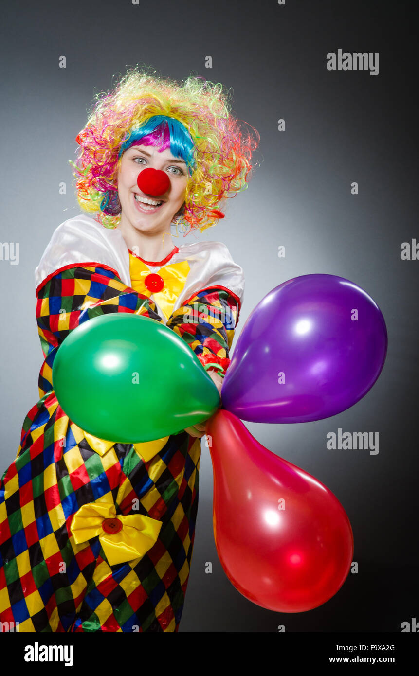 Funny clown in comical concept Stock Photo - Alamy
