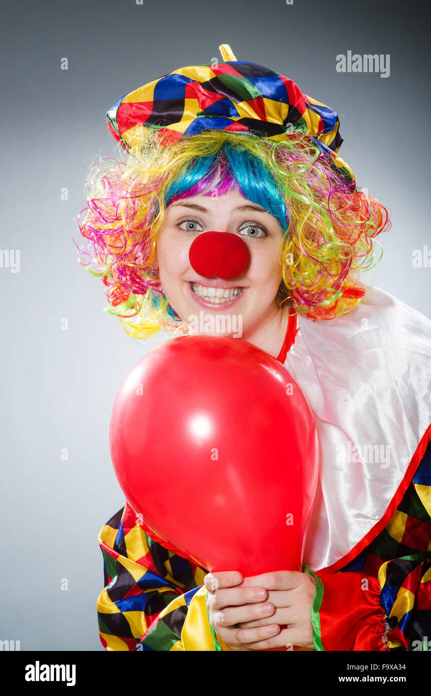 Funny clown in comical concept Stock Photo - Alamy