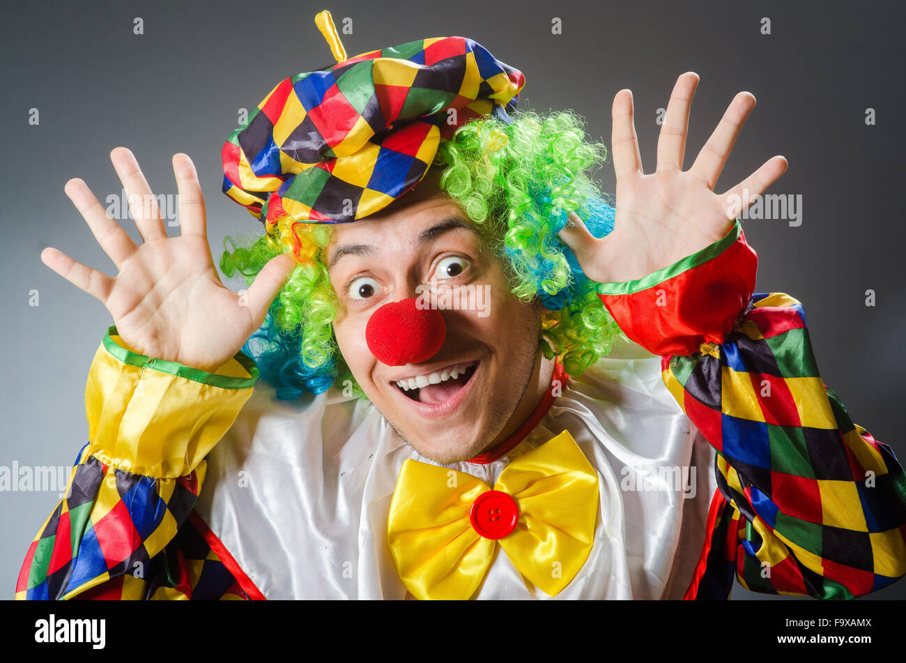 Funny clown in comical concept Stock Photo - Alamy