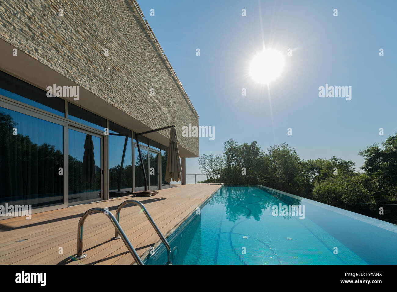 Infinity pool on the bright summer day Stock Photo - Alamy
