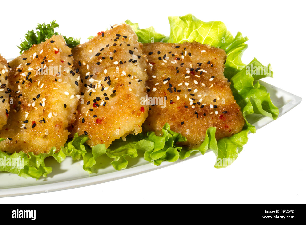 Roasted fish with lemon Stock Photo - Alamy