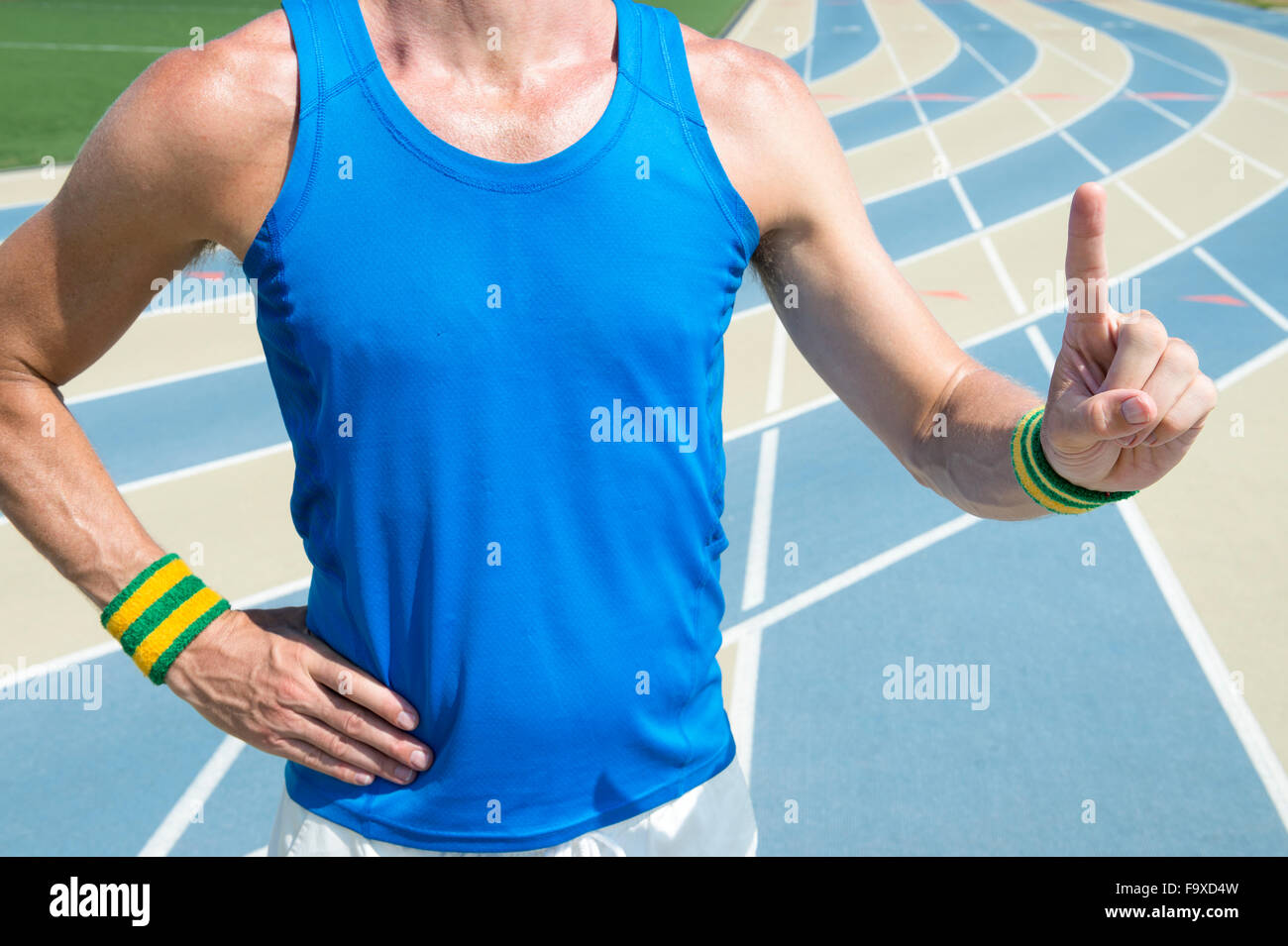 Number one athlete in Brazil colored wristbands holding up single ...