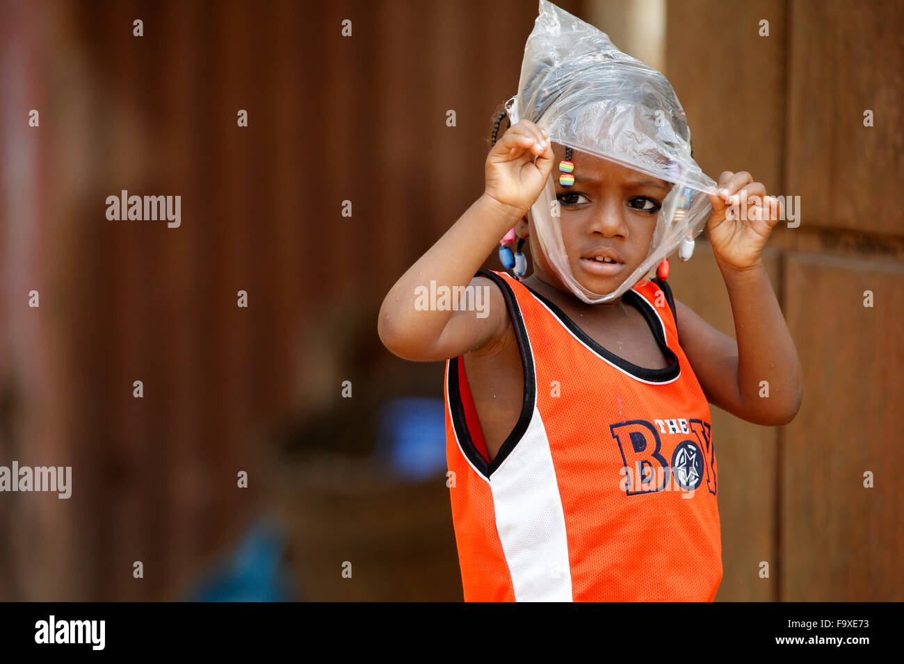 Girl playing with a plastic bag Stock Photo - Alamy