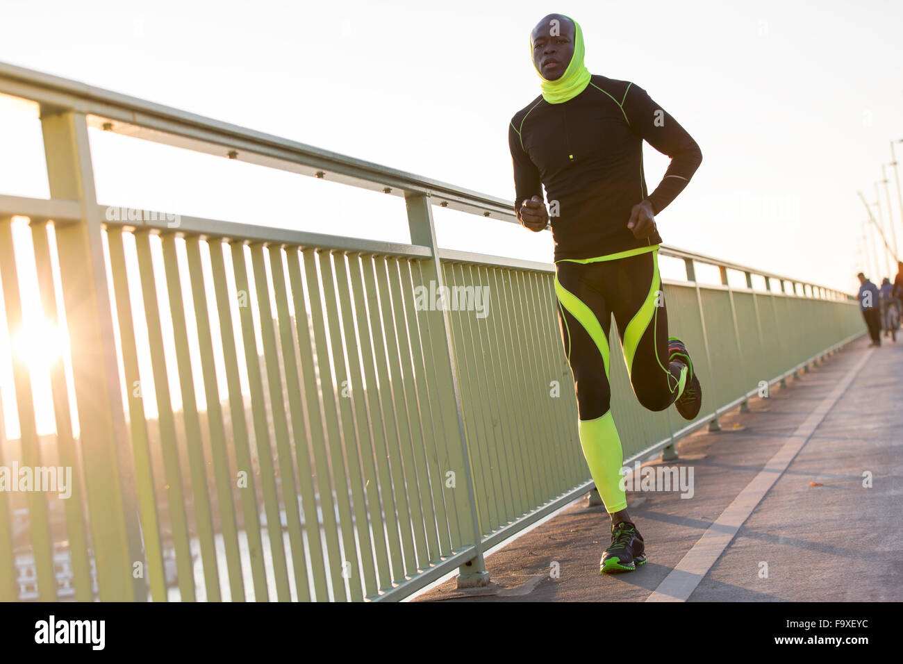 African athlete running on bridge hi-res stock photography and images ...