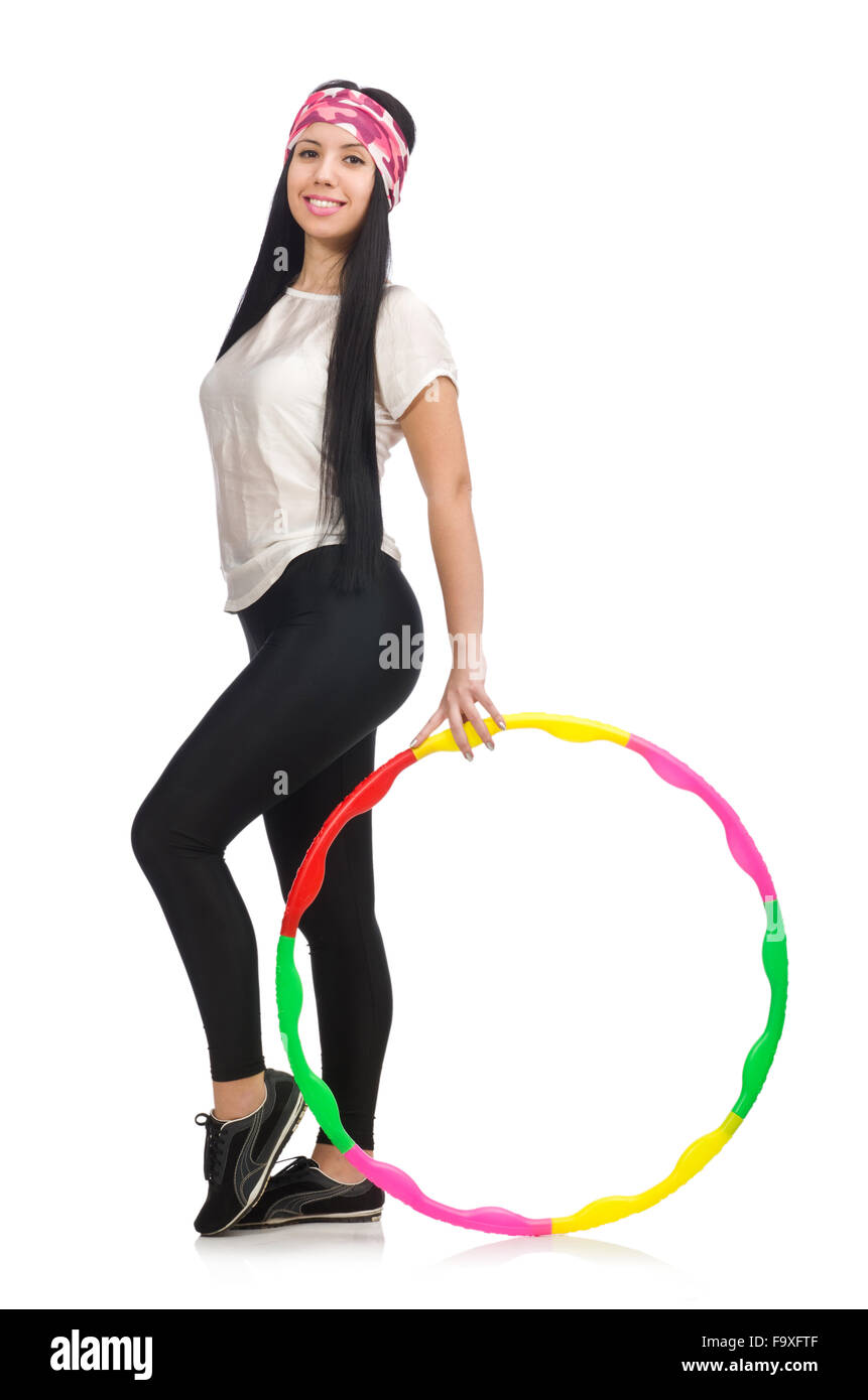 A girl in sport suit with hula hoop isolated on white Stock Photo - Alamy